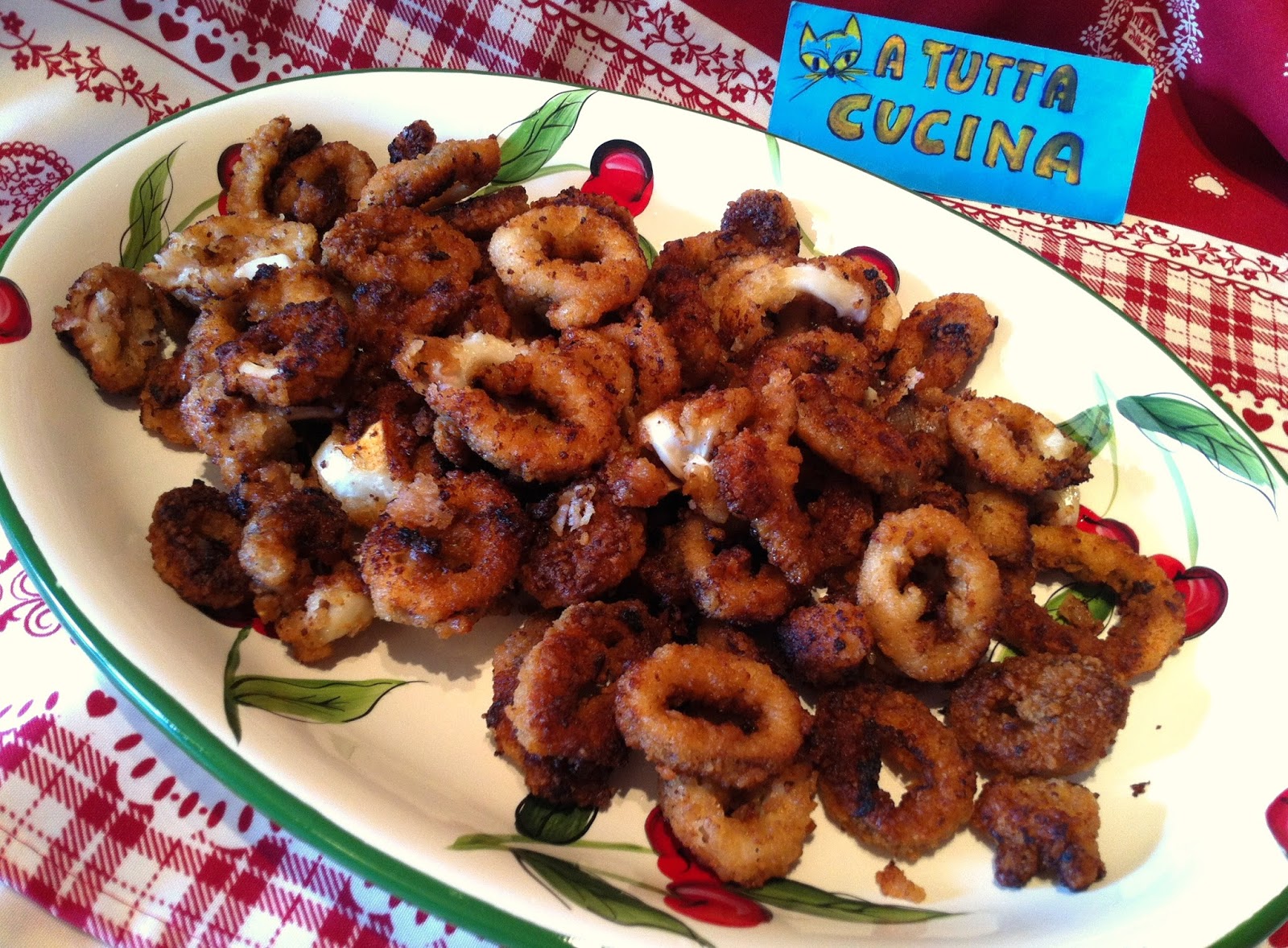 A TUTTA CUCINA: ANELLI di CALAMARI al GRANA