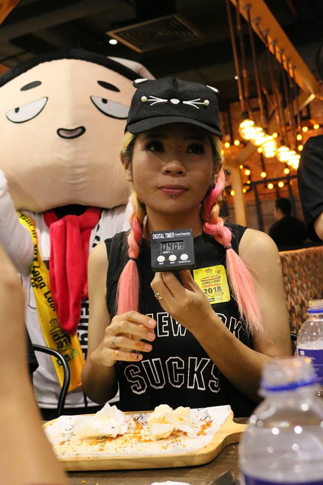 COMPETITORS VYING FOR CHAMPION IN 16 MINUTES SPEED EATING CONTEST