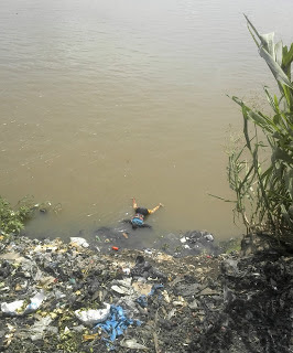 Photos: Dead Body Of Murdered Woman Seen Floating On River Niger At ...
