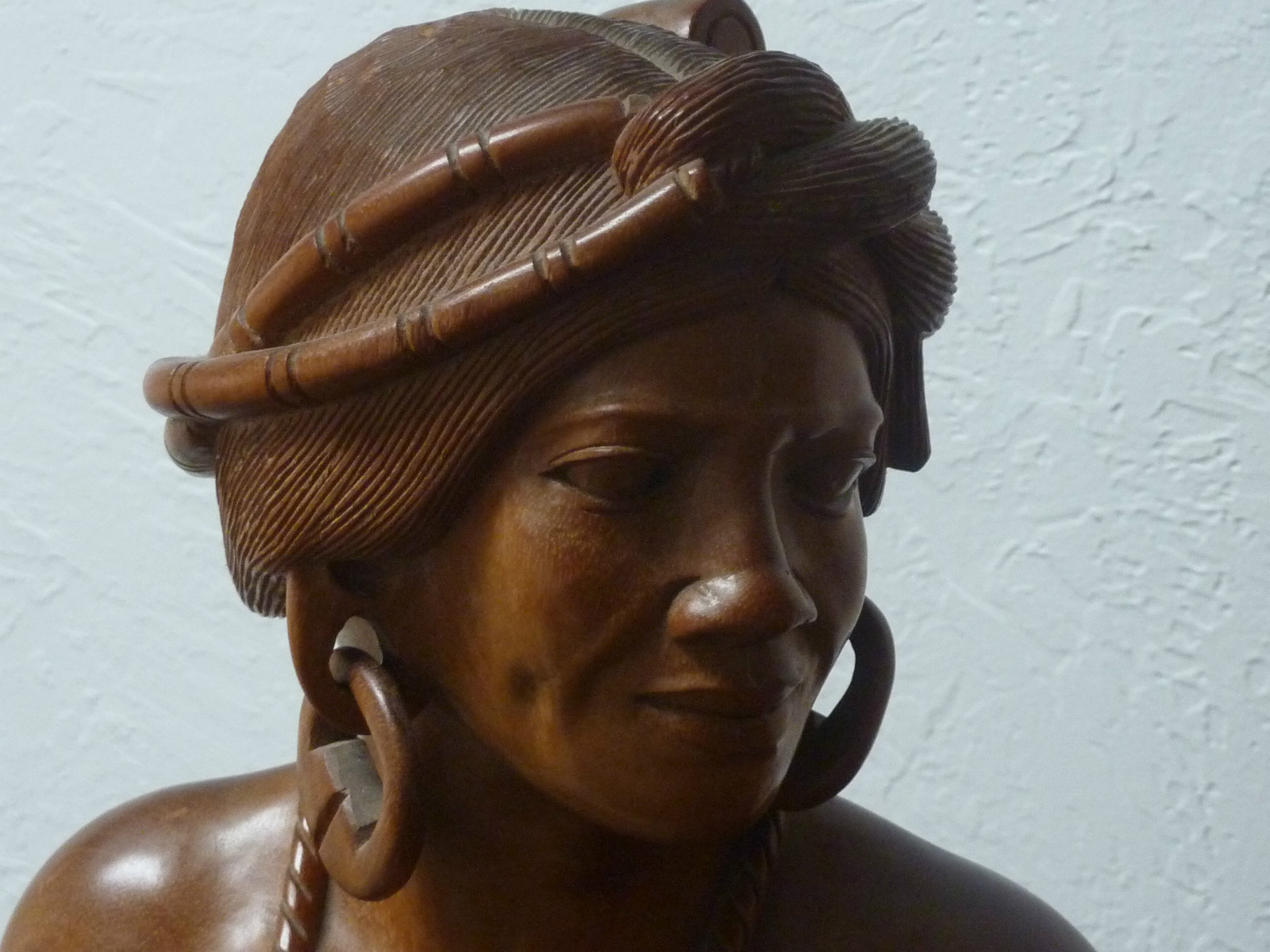 A FLY AND A FLEA: 223. A PAIR OF CARVED IGOROT BUSTS