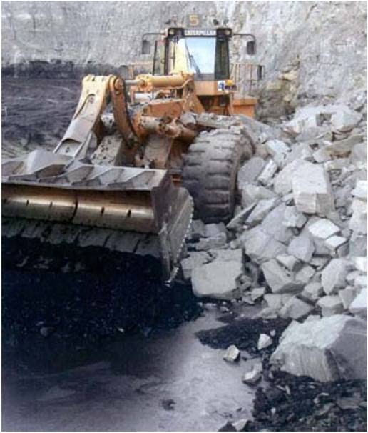 Mining Mayhem: Highwall Failure Onto Loader