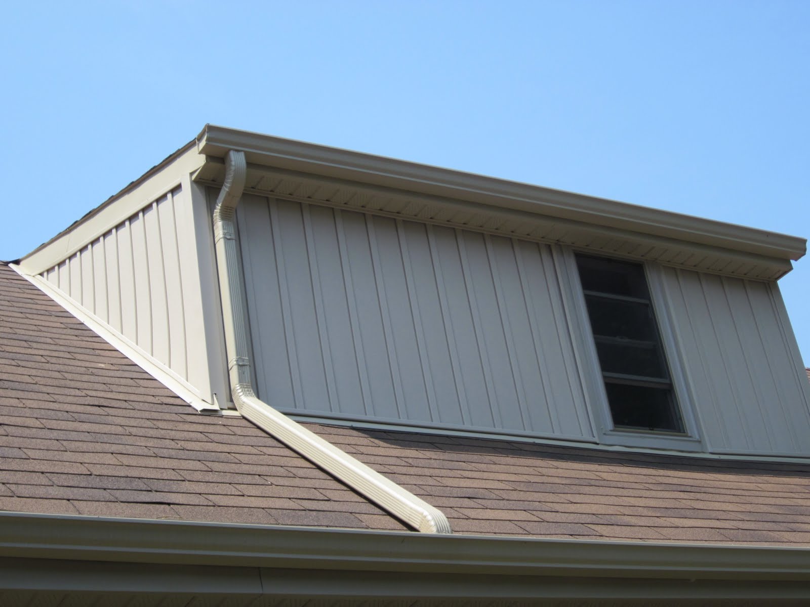 The Eavestrough Company: Why an upper Downpipe should NEVER be routed ...