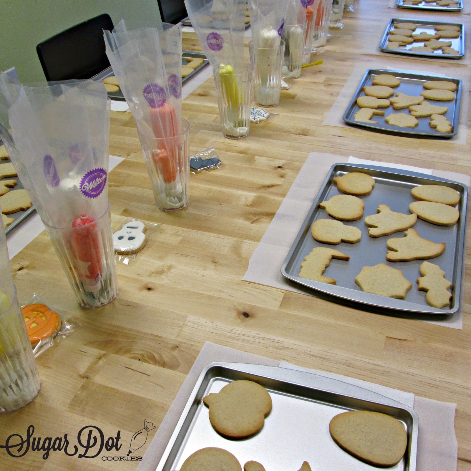 And here they are decorating their Halloween cookies......