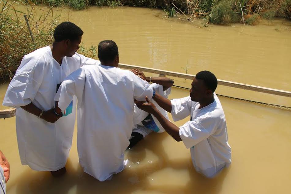 Prophet Joshua Iginla baptises his mother at River Jordan in Israel ...