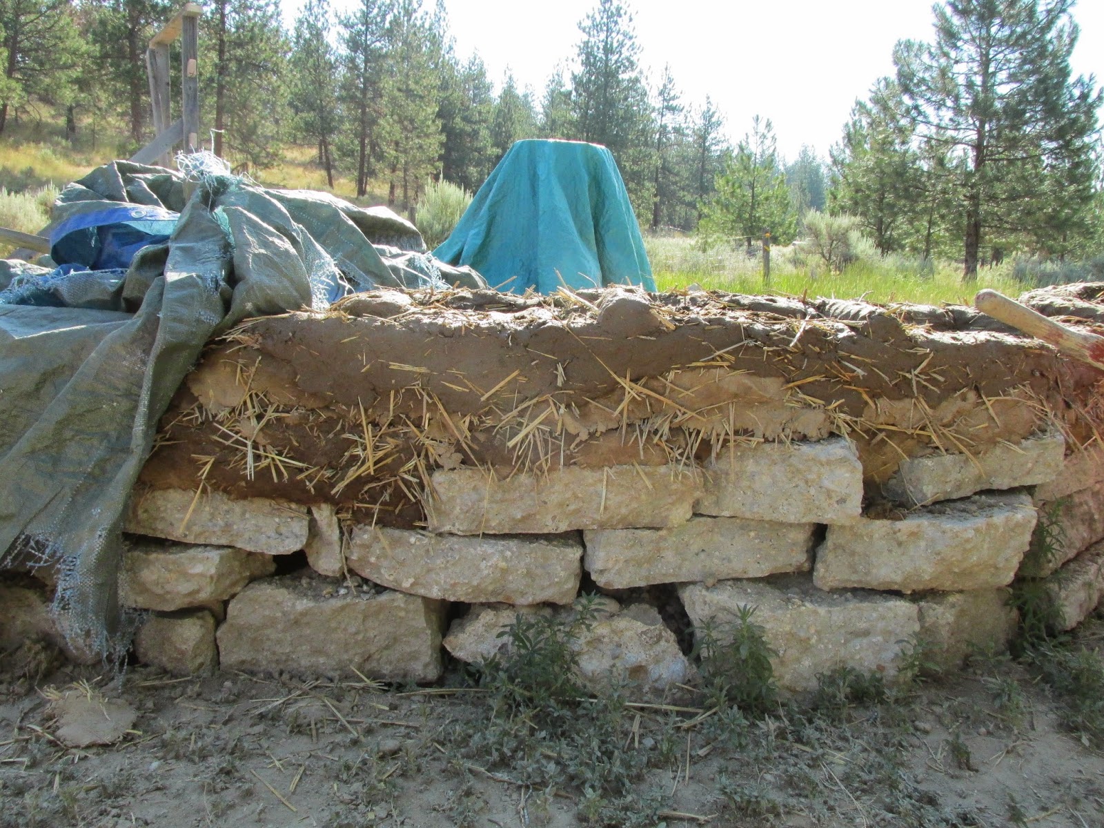 Cobbing the walls ~ Montana Cob Cottage: Sleeping loft