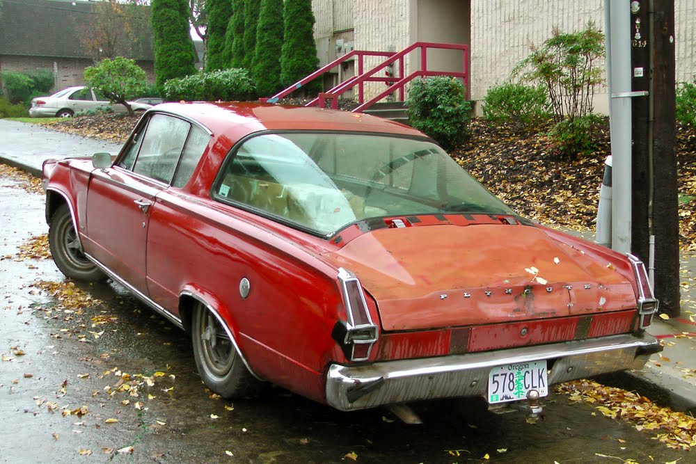 OLD PARKED CARS.: 1966 Plymouth Barracuda.