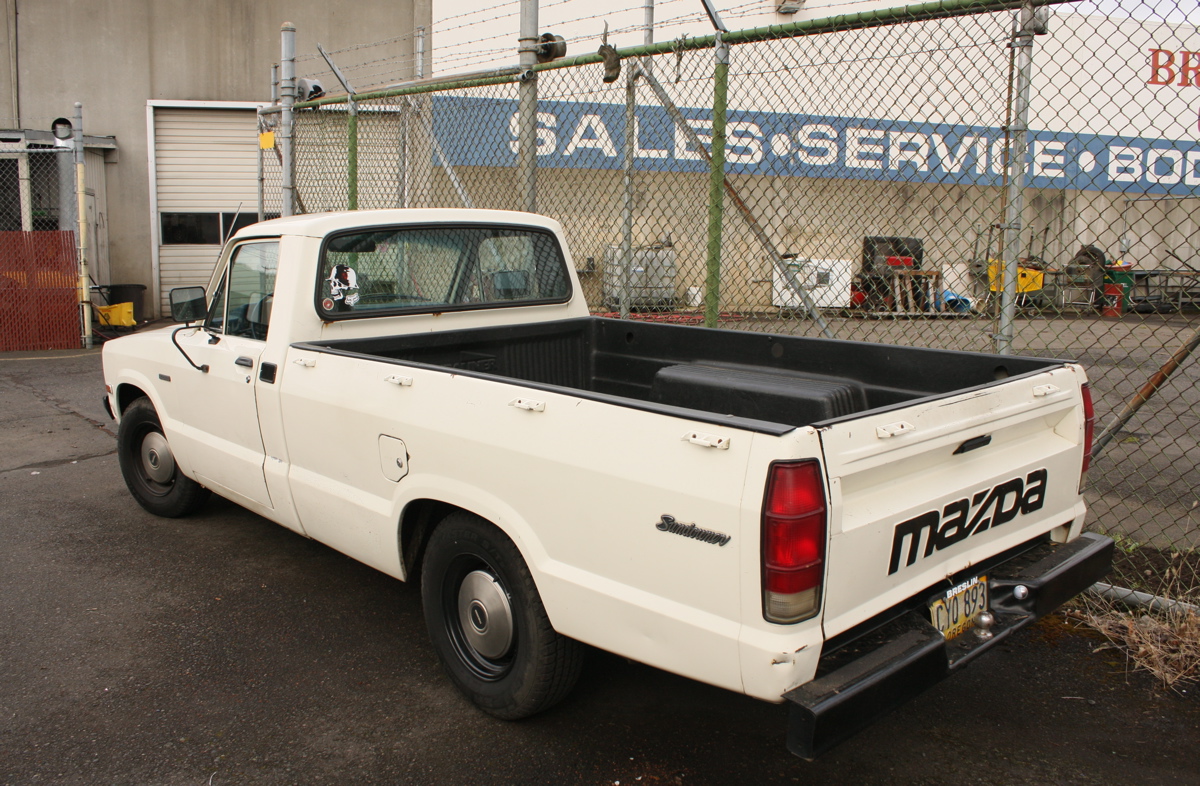 OLD PARKED CARS.: 1983 Mazda Sundowner.
