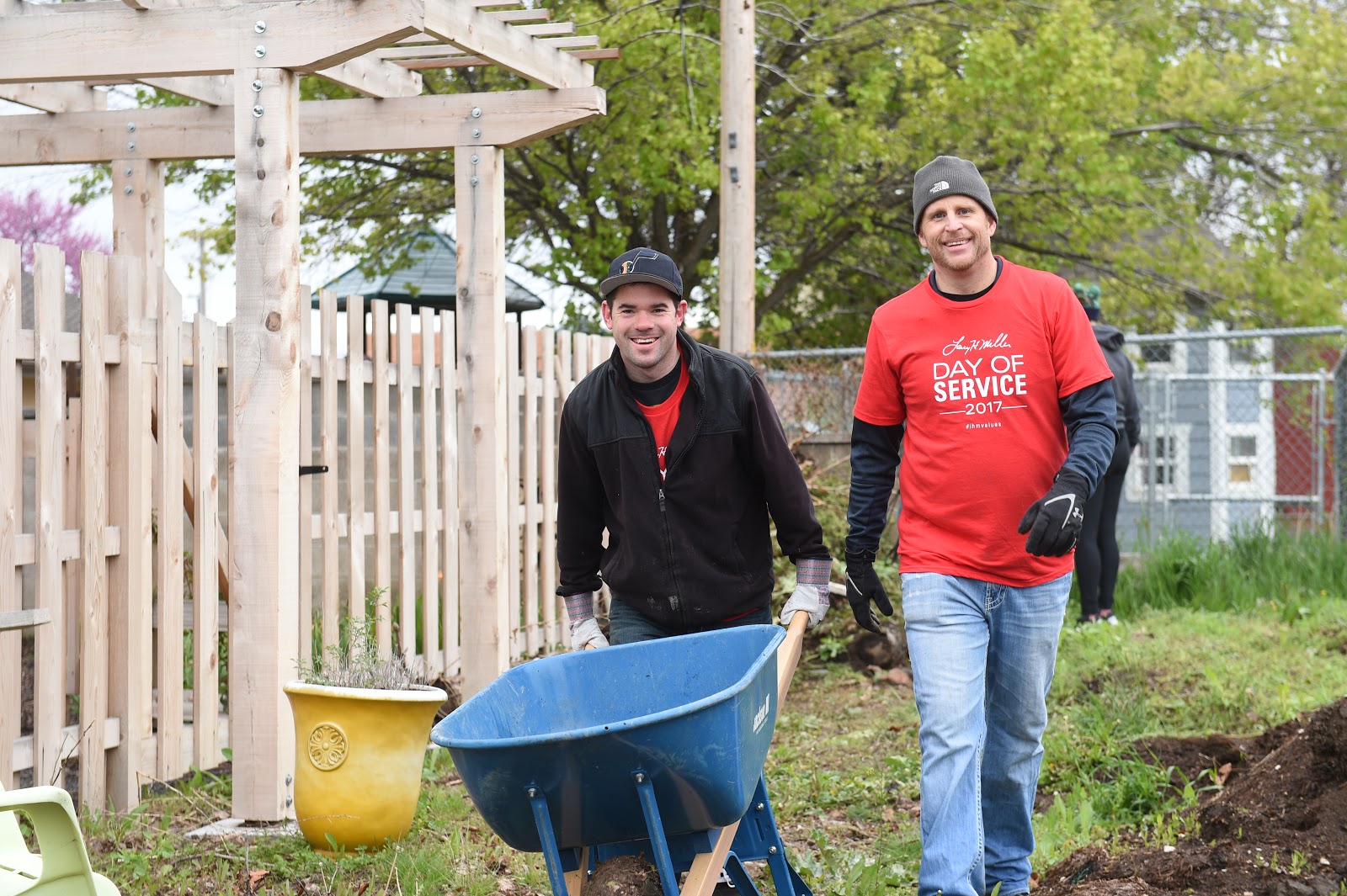 Larry H. Miller Group Pitches In At Community Gardens