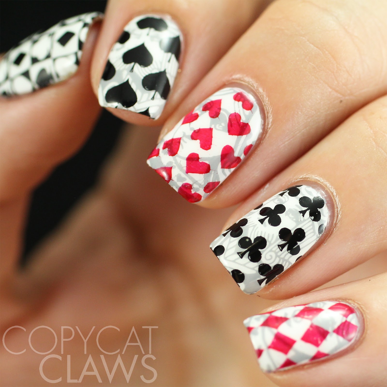 Copycat Claws: The Digit-al Dozen does Four - Card Suits