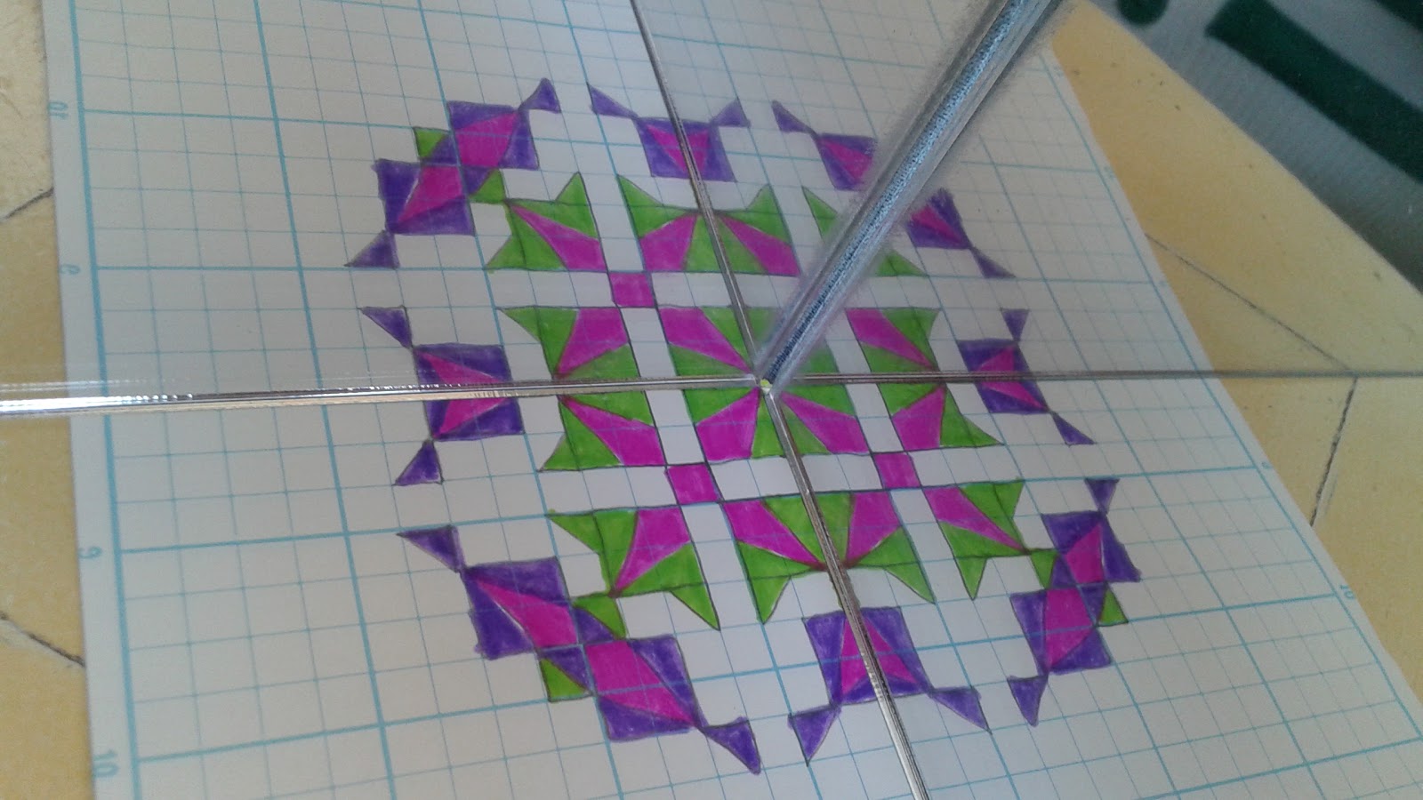 Websterquilt: Designing a Pattern Using Mirrors