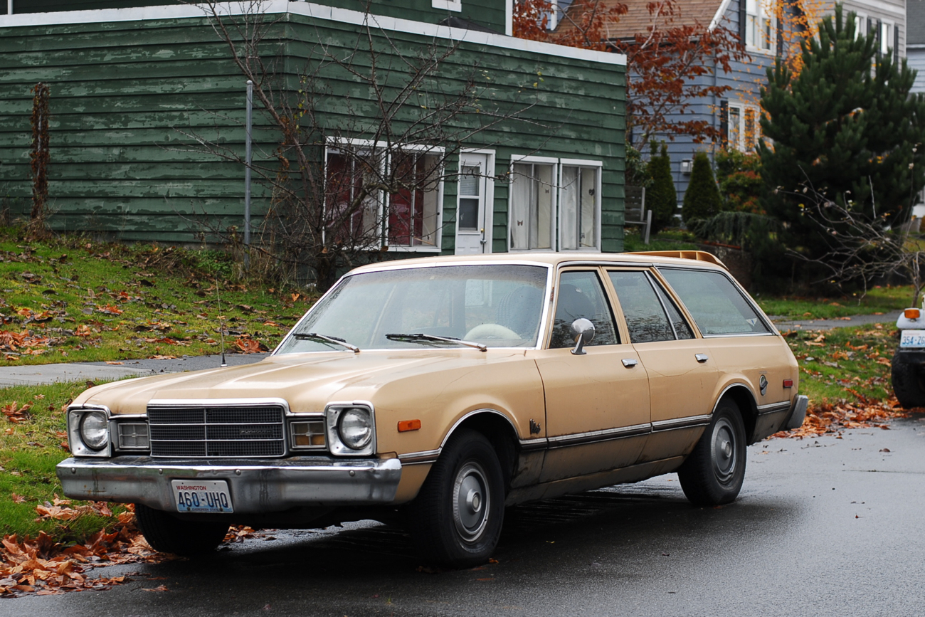 OLD PARKED CARS.: 1976 Plymouth Volare Station Wagon.