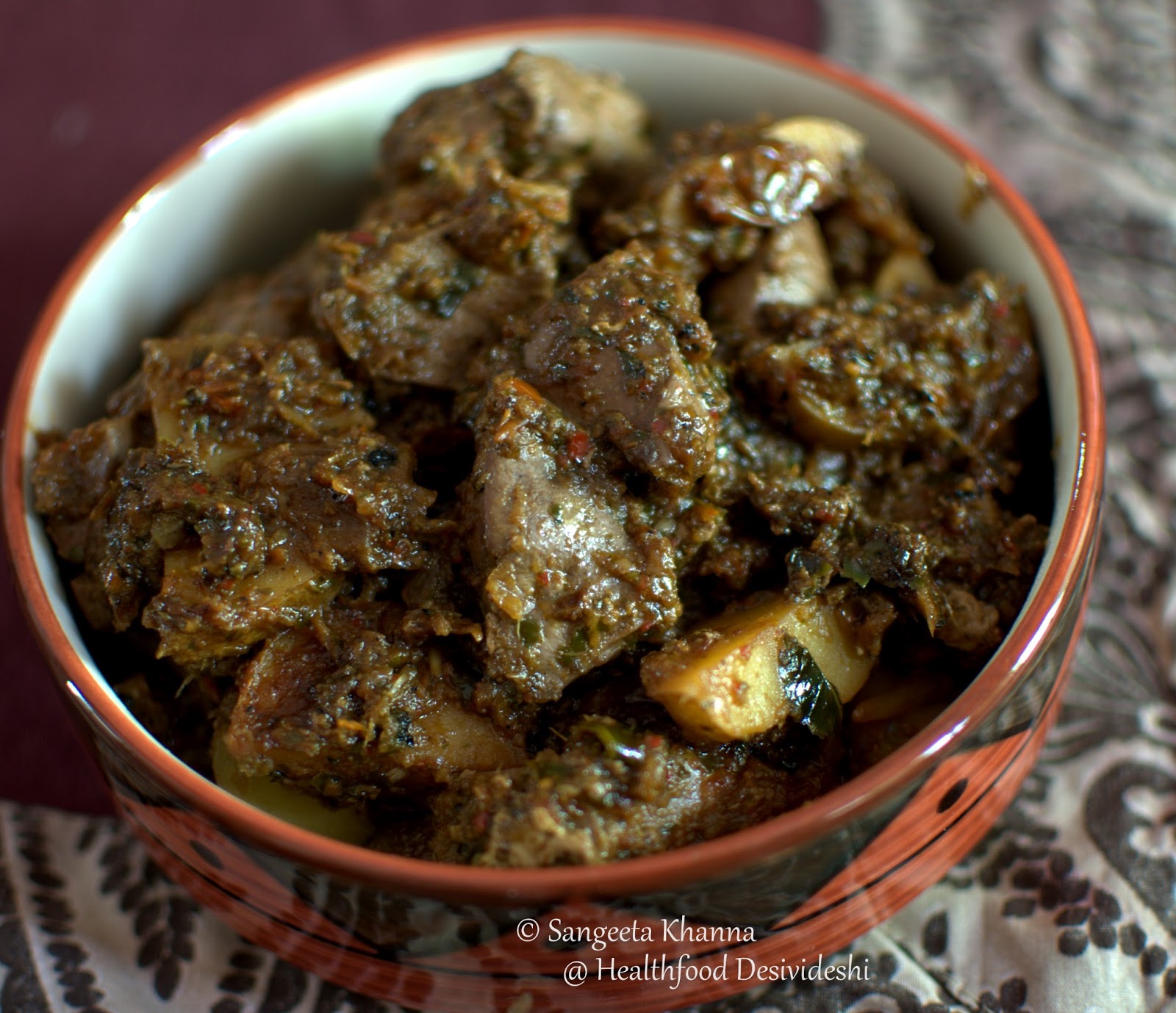 goat liver stir fry with curry patta and sun dried tomatoes paste, a ...