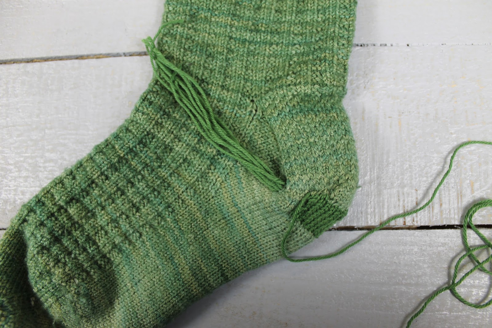 The Feisty Redhead: Patching a Huge Hole in Knit Socks