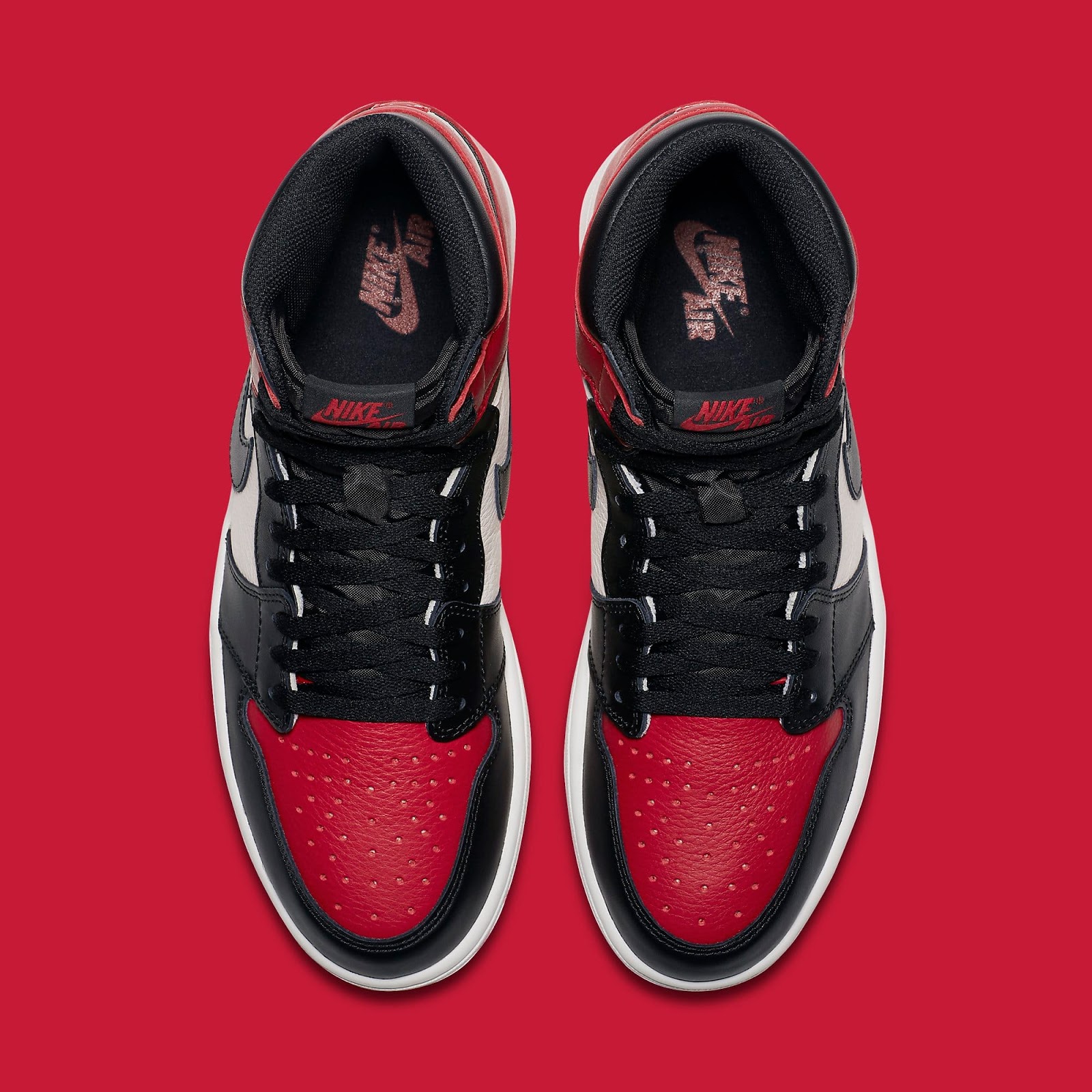 A Detailed Look at 'Bred Toe' Air Jordan 1s Releasing on Feb. 24.