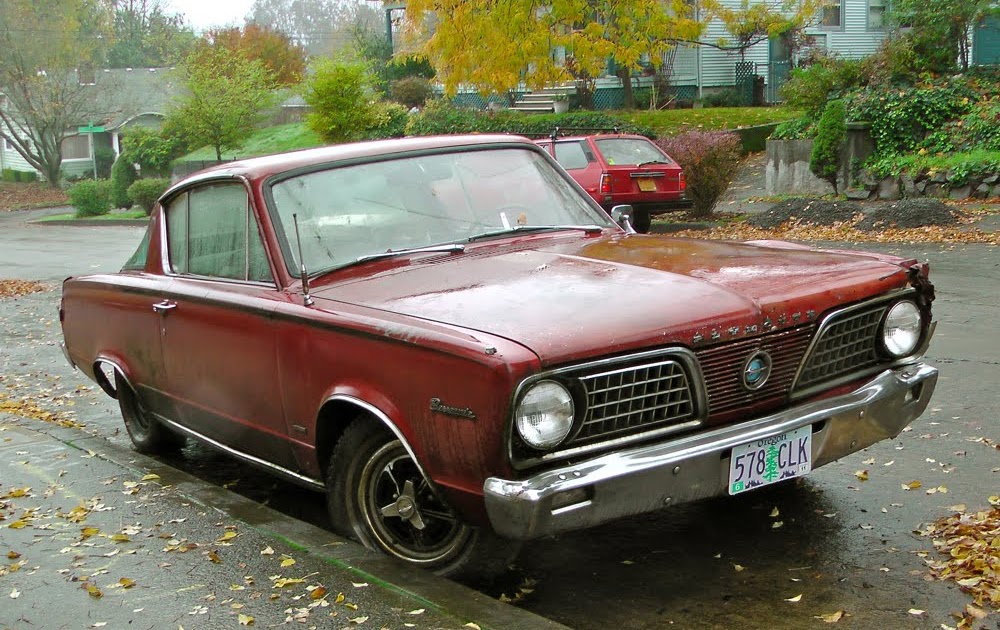 OLD PARKED CARS.: 1966 Plymouth Barracuda.