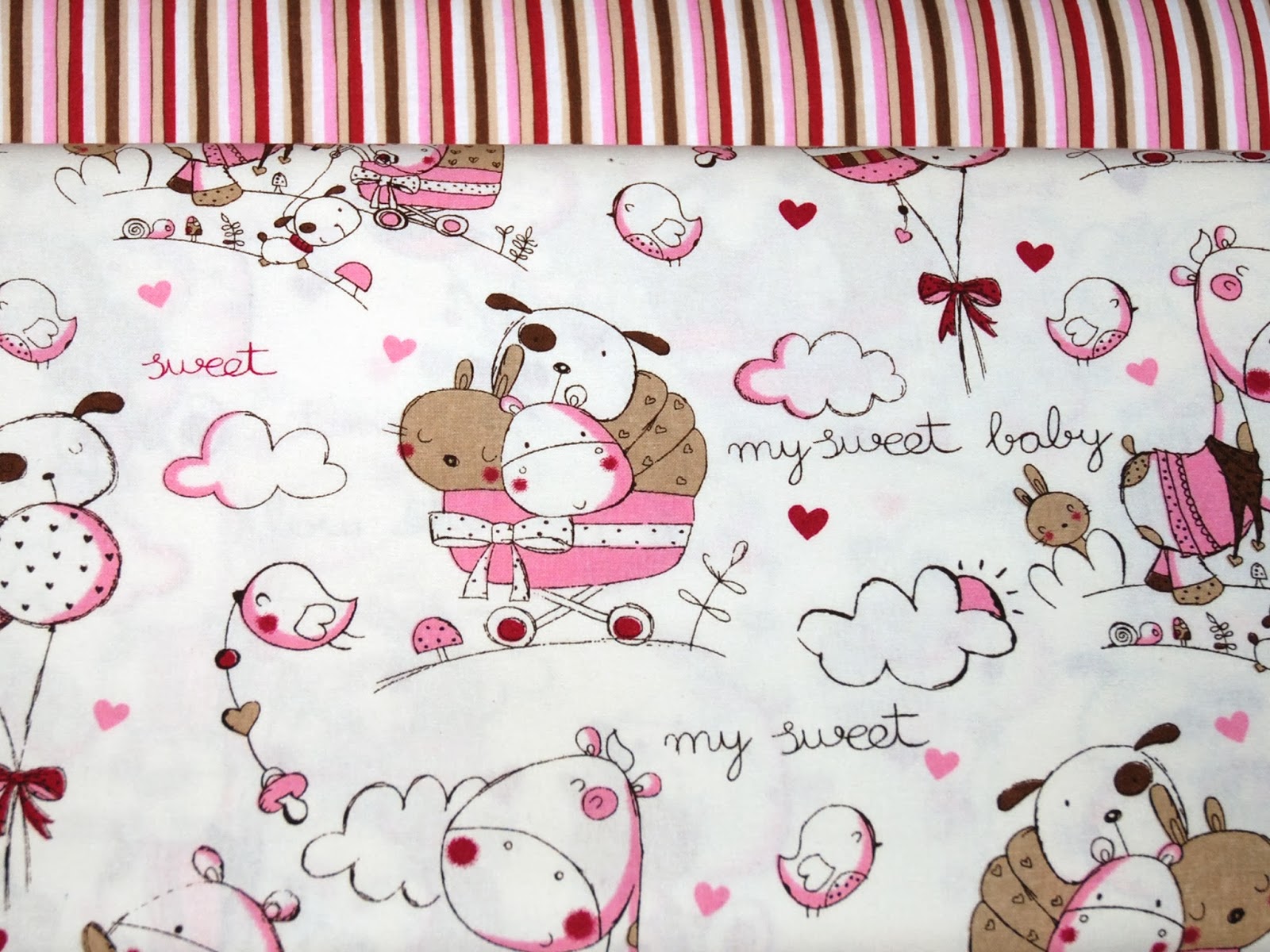 Bocinets d'encís: Telas de bebé y una canastilla