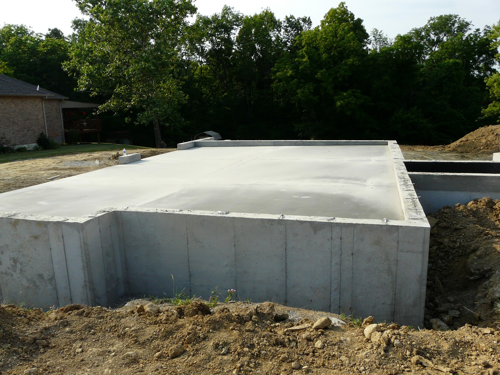 Jamie and Carrie's Home Building Adventures: Day 24 - Basement Slab Poured