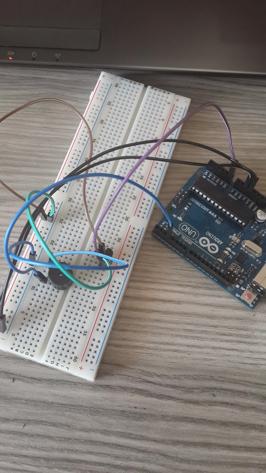 leds vs. buttons: Simple fire alarm system with using LM35 and buzzer