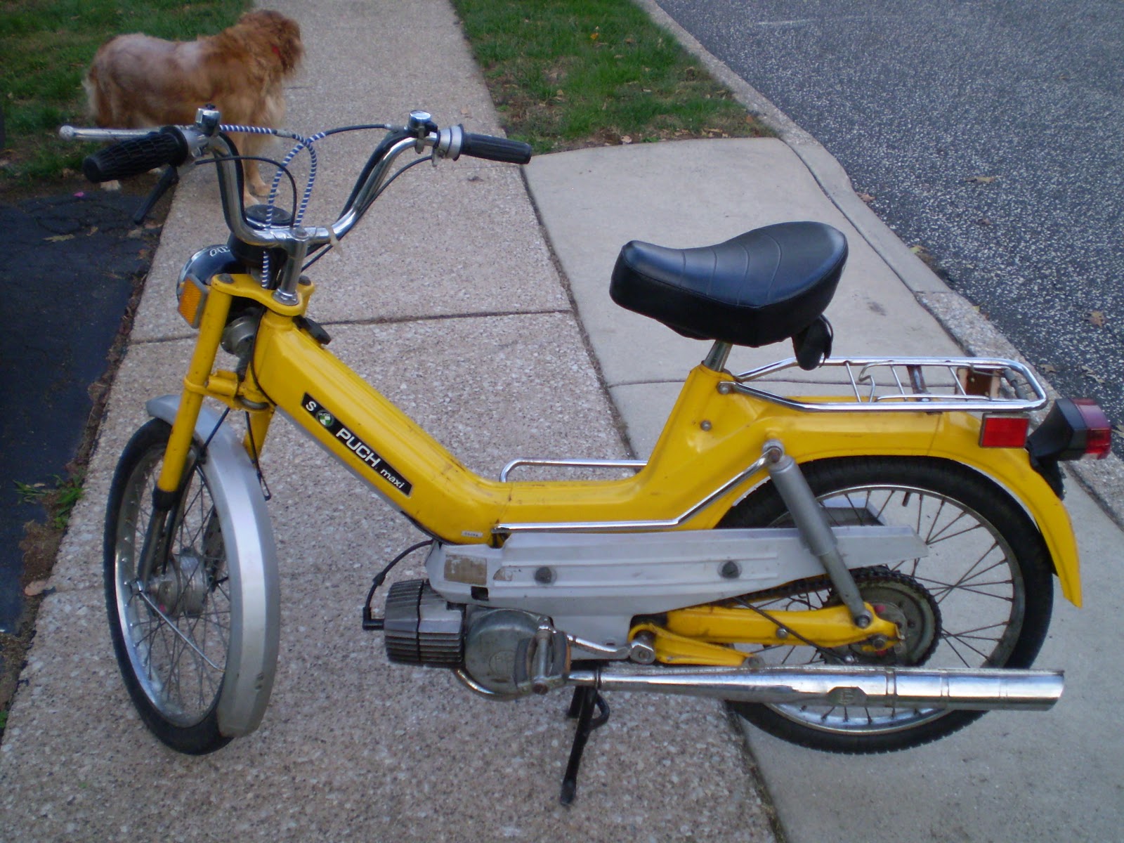 small garage: Some mopeds that came into the garage