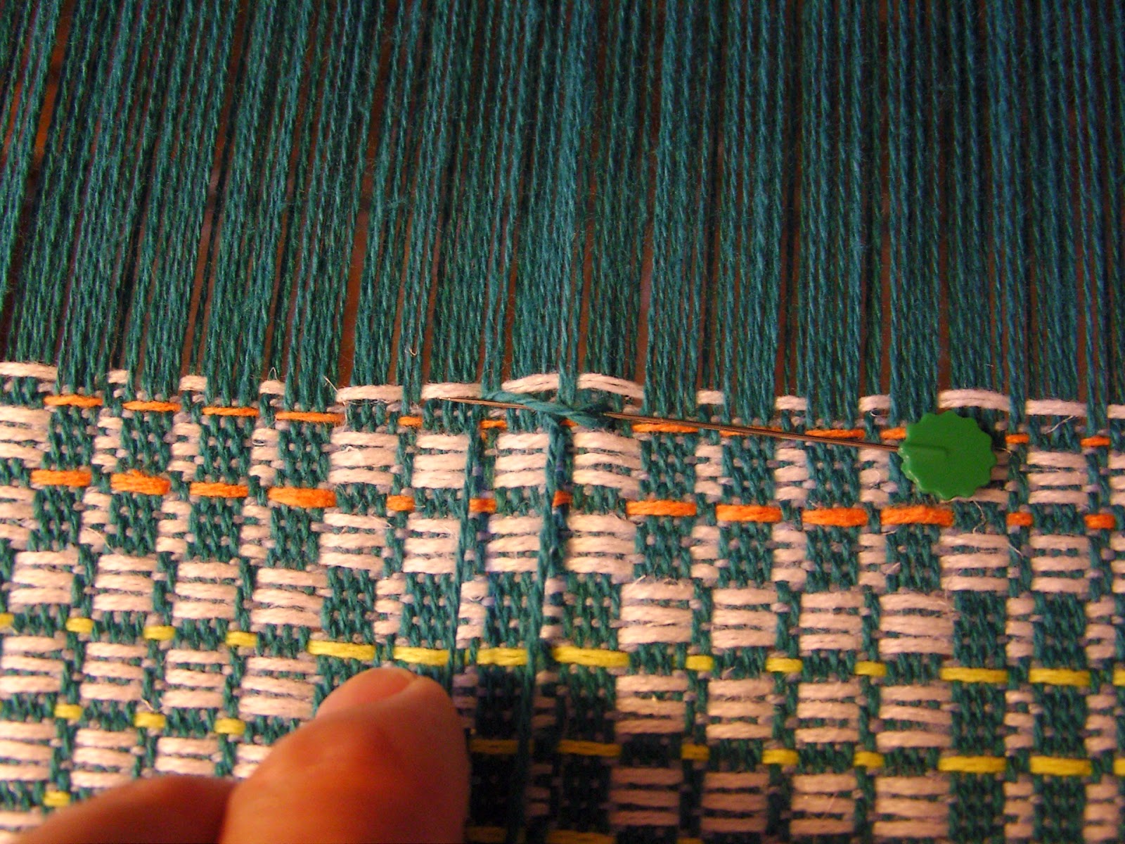 Daisy Hill Weaving Studio: Repairing a Broken Warp Thread on the Loom