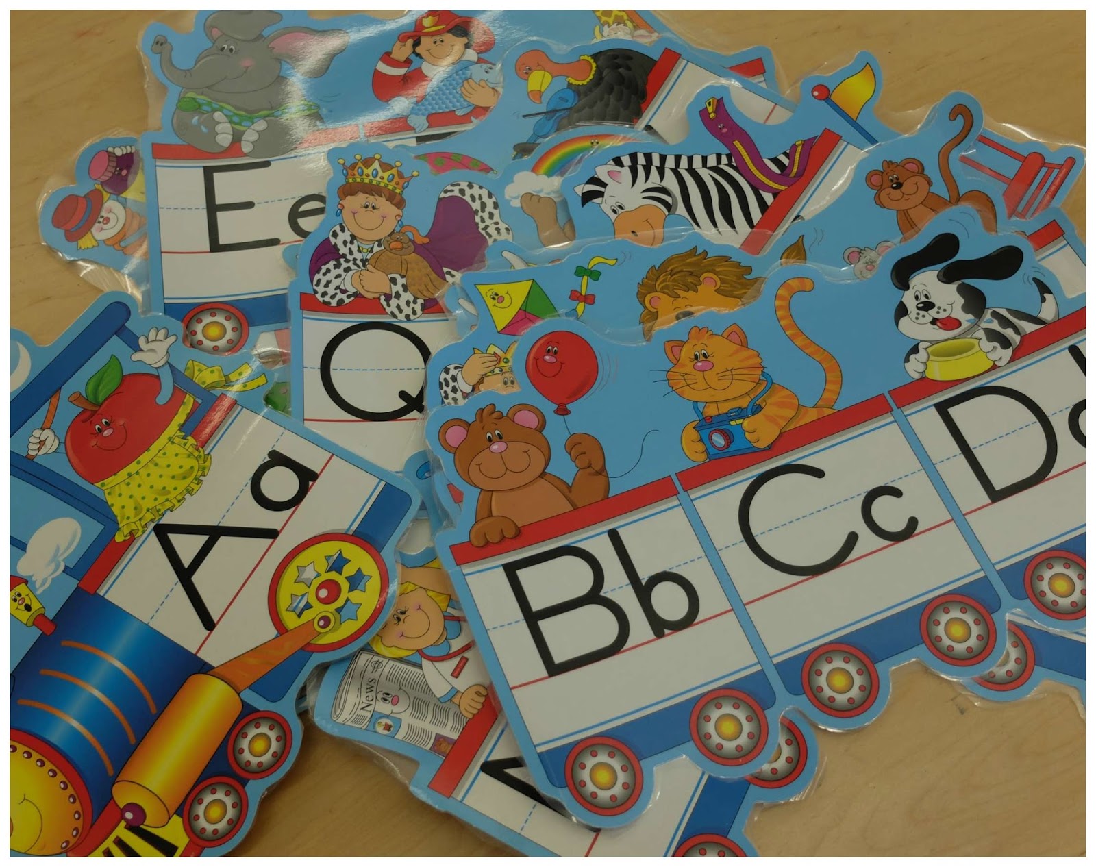 reggio inspired natural alphabet - rubber boots and elf shoes