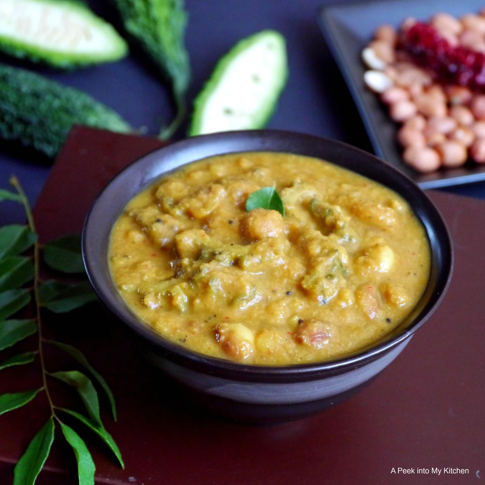 A Peek into My Kitchen: Pavakkai Pitlai / Bitter Gourd Stew ~ Day 118