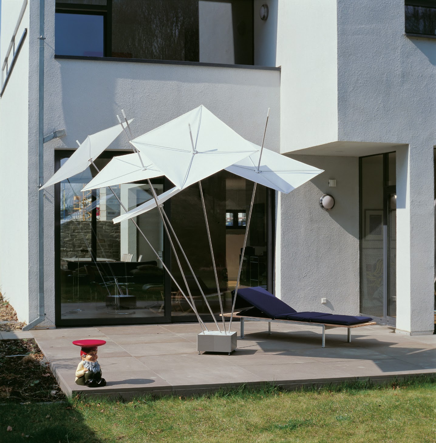 avant garde design: multiple varying summer umbrellas.