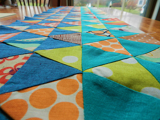 Molly Flanders: Pyramid Quilt....trimming up the sides