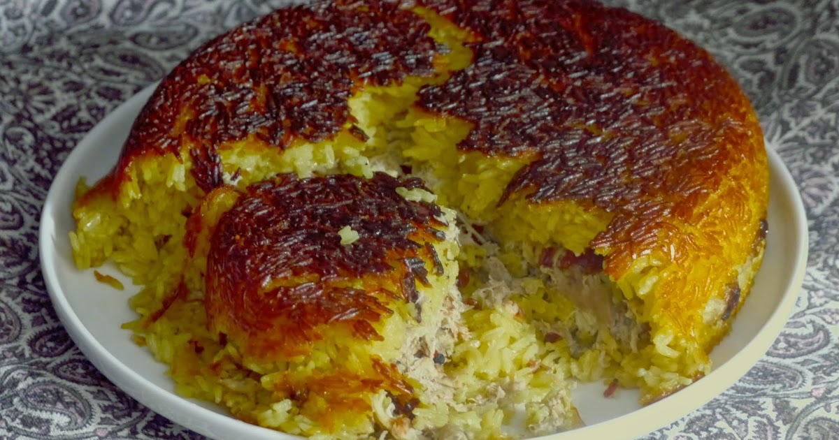 Persian Tahchin with shredded chicken thighs and aromatic broth boiled rice