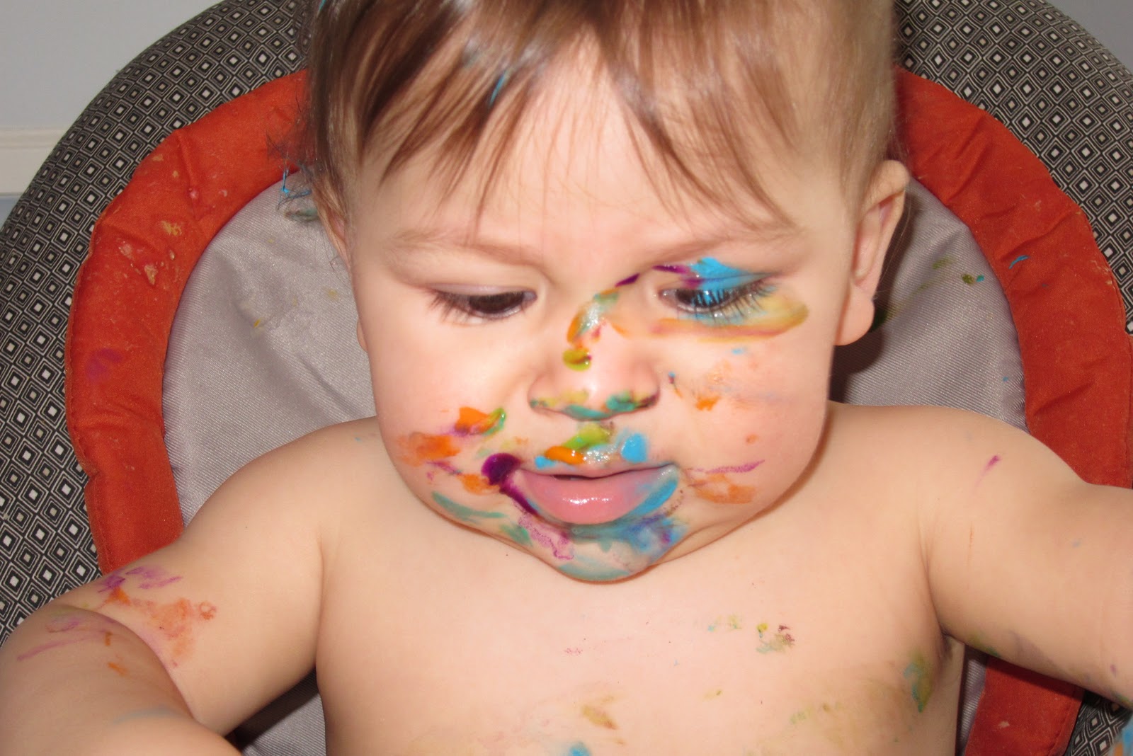 A Grumpy Baby Finger Paints