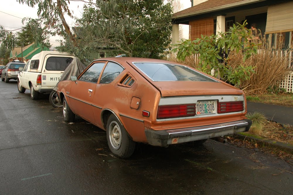 OLD PARKED CARS.: 1977 Plymouth Arrow 160 Hatchback.