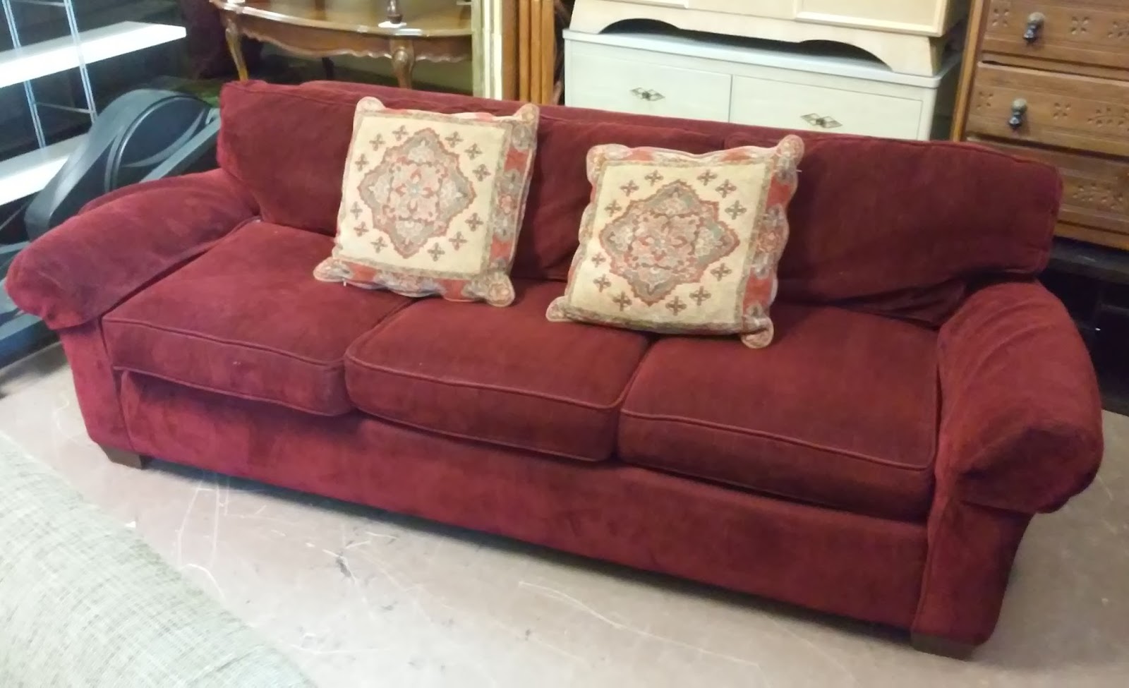 UHURU FURNITURE & COLLECTIBLES: SOLD **REDUCED** Ruby Red Sofa - $190