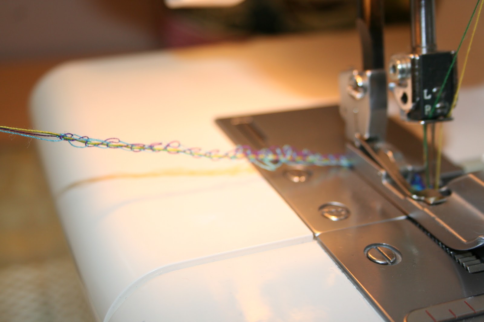 Tammy's Craft Emporium: White Superlock 2000 serger and dog bed.