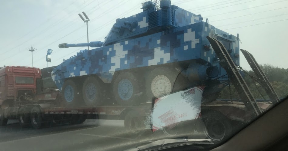 China Defense Blog: PLAN Marine's two new wheeled light tanks