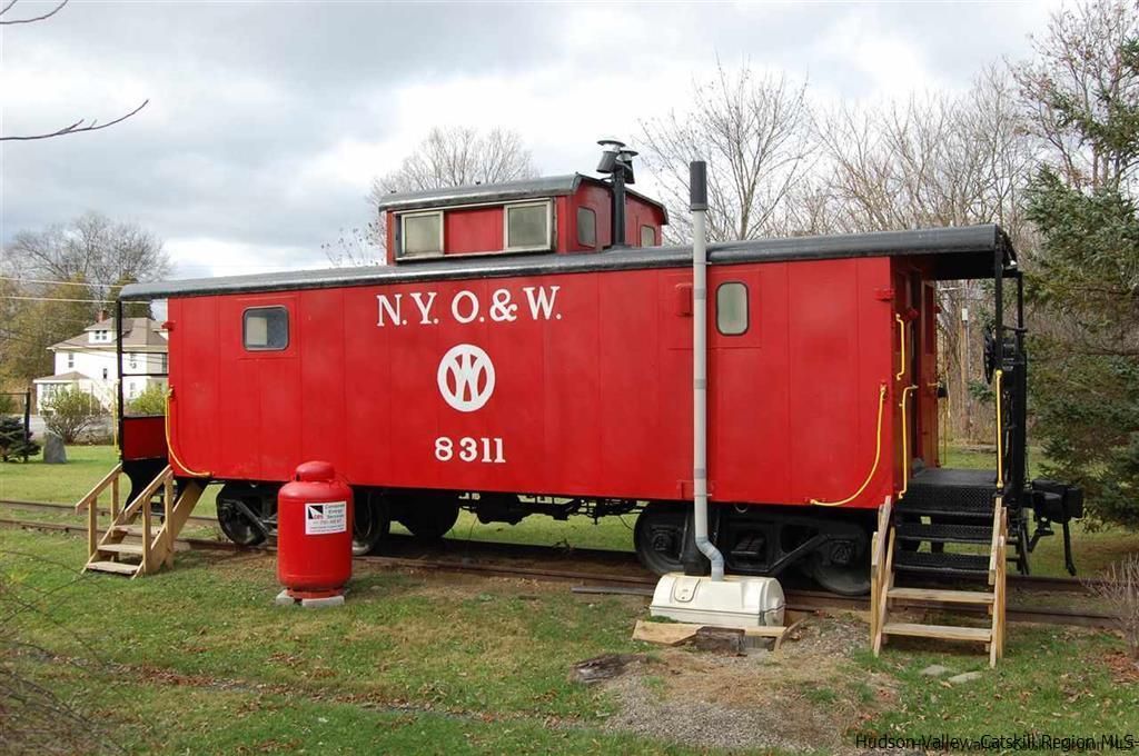 Sweet House Dreams: 1902 Train Station with Caboose in Accord, New York