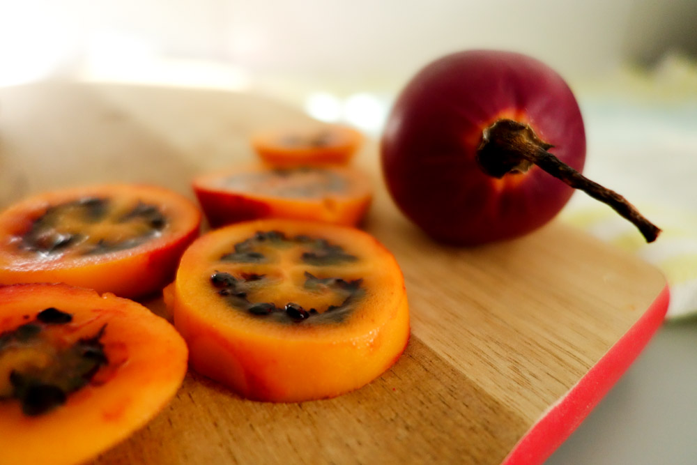 the indolent cook: ginger-honey poached tamarillo compote