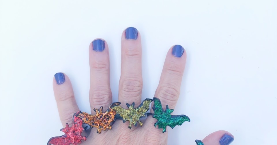 Glitter rainbow bat rings