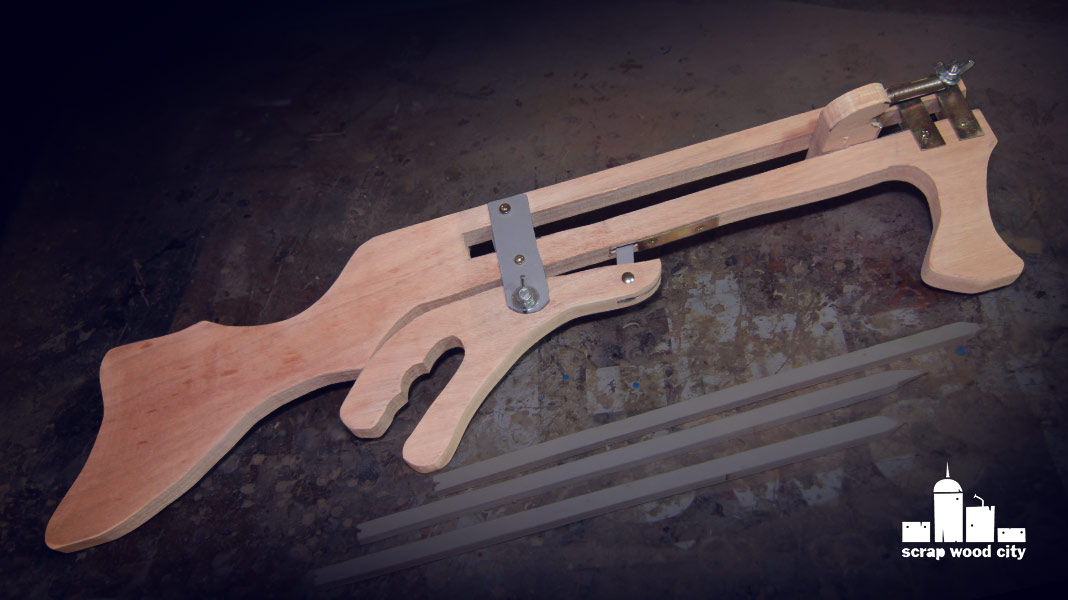 scrap wood city: DIY spring powered zombie apocalypse toy rifle