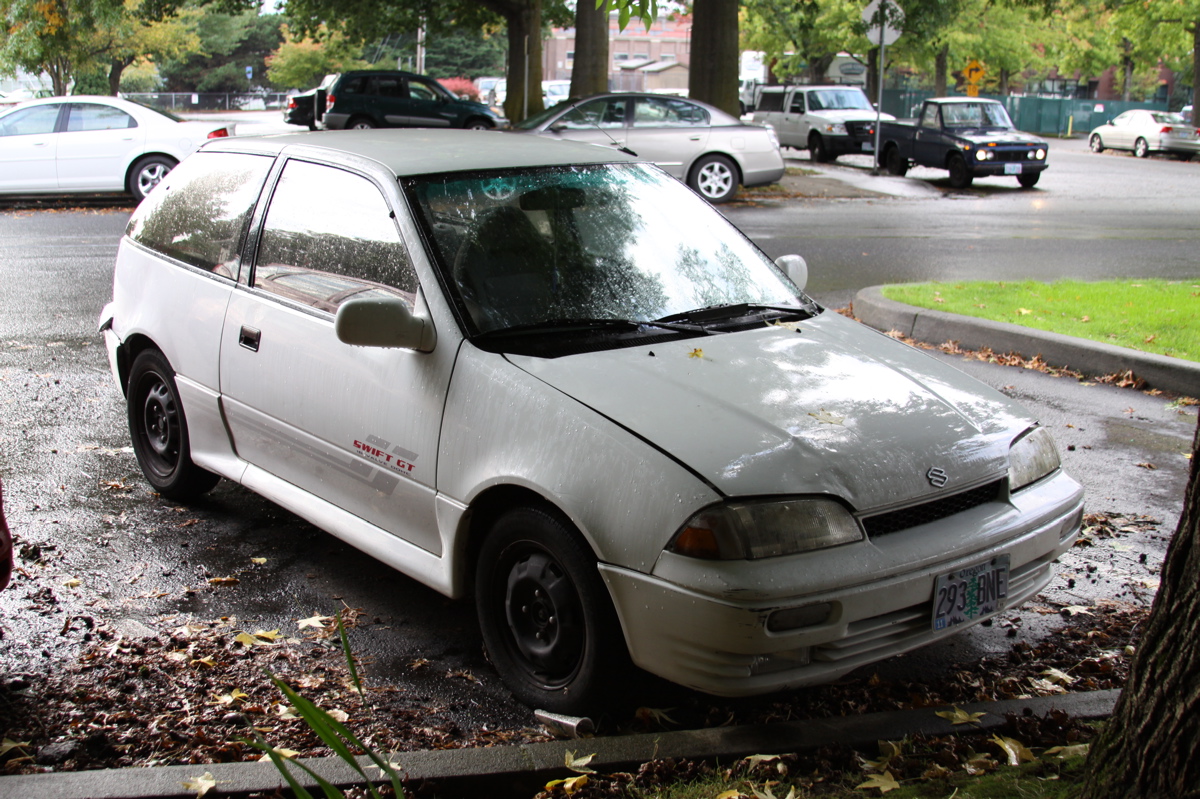 OLD PARKED CARS.: 1992 Suzuki Swift GT.