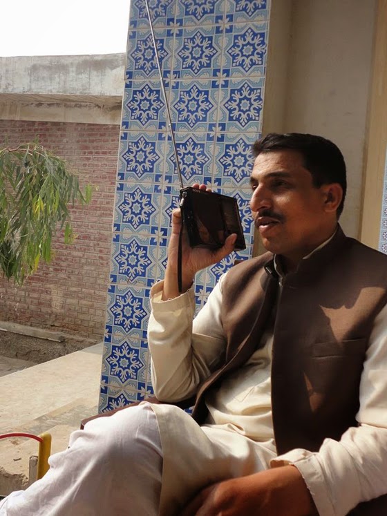 A Pakistani listener Mr. Ghulam Mustafa Memon listening radio ...