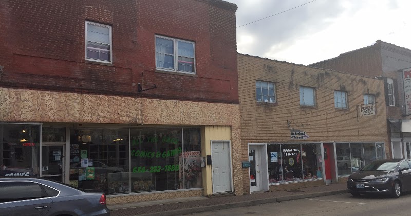 Real Estate News: FOR SALE - Two conjoined buildings make up the 13,000 ...