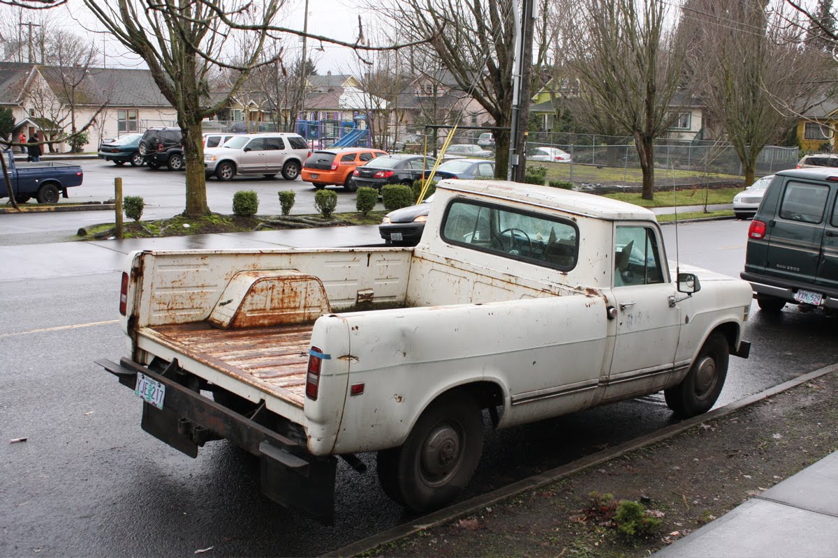 OLD PARKED CARS.: 1973 International Harvester 1210.