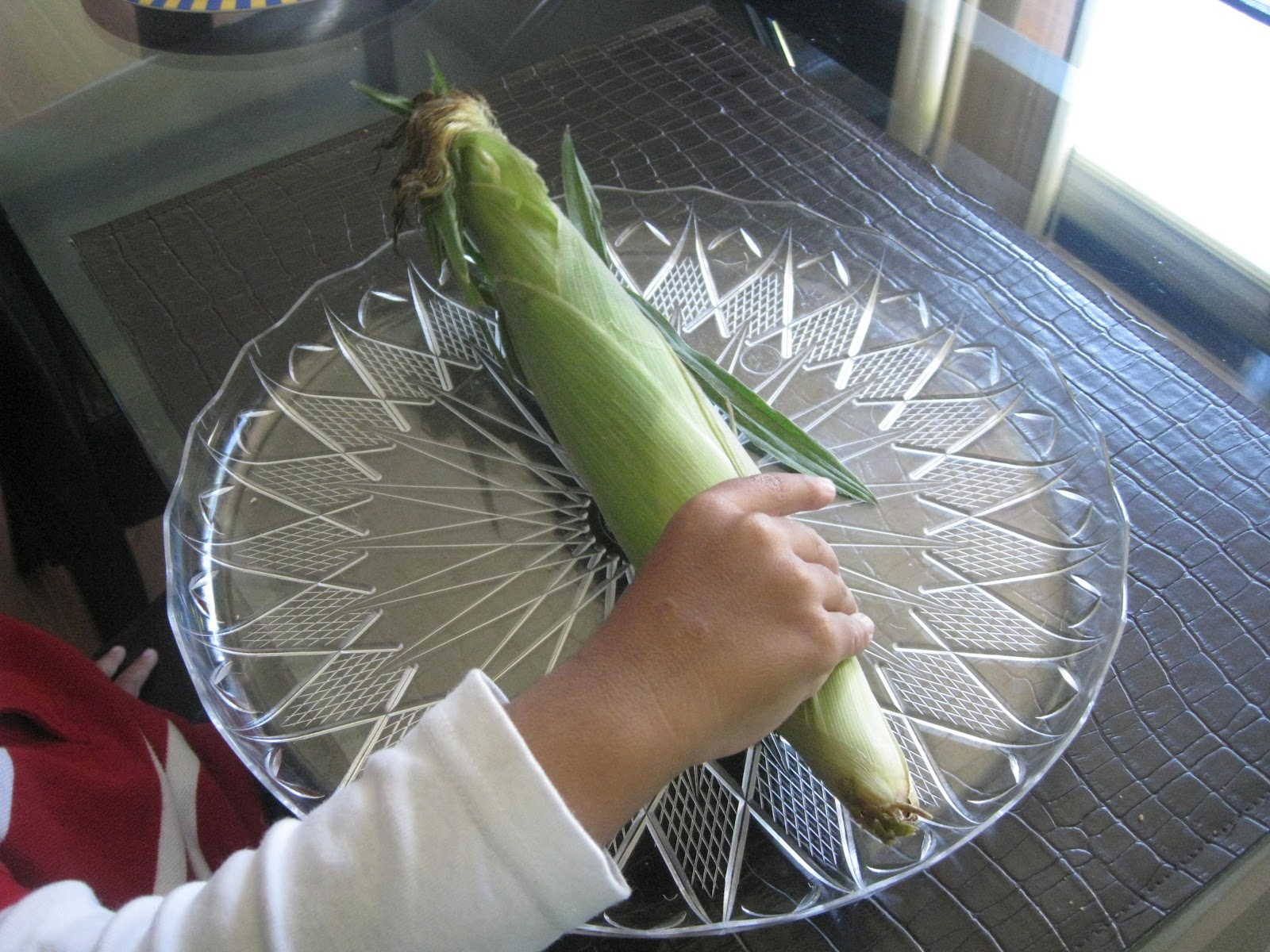 PRACTICAL LIFE ACTIVITY IDEA: Peeling the corn