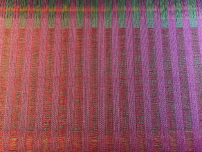 Random Acts of Color: Collapse Fabrics with Deflected Double Weave