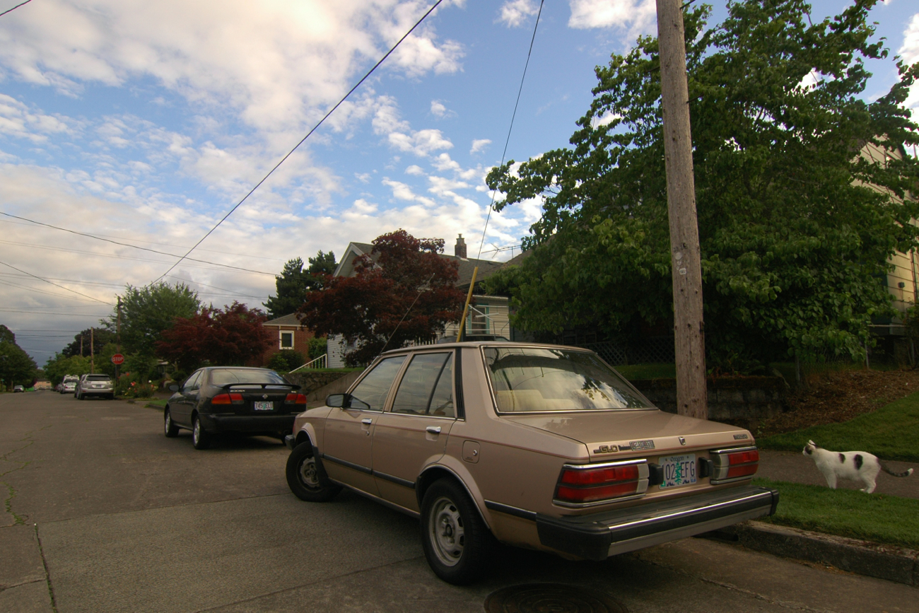 OLD PARKED CARS.: 1982 Mazda GLC.