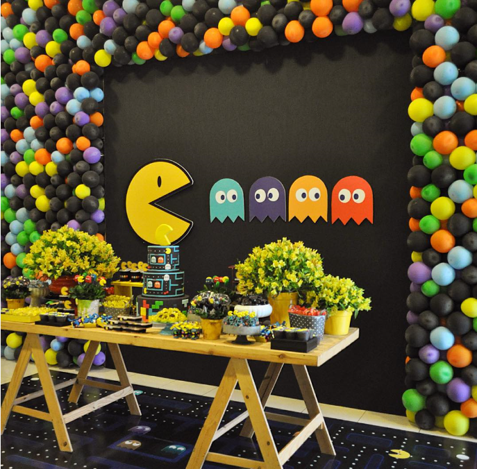 Diversión y juegos en Arcade una fiesta temática de Pacman