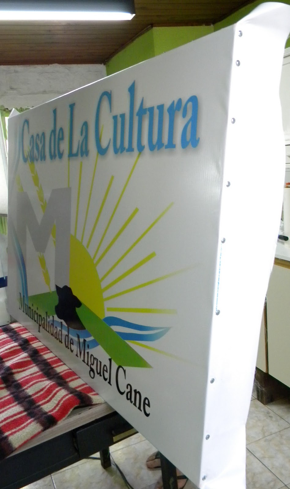 IDEAS CARTELES: proceso de tensado de lona front