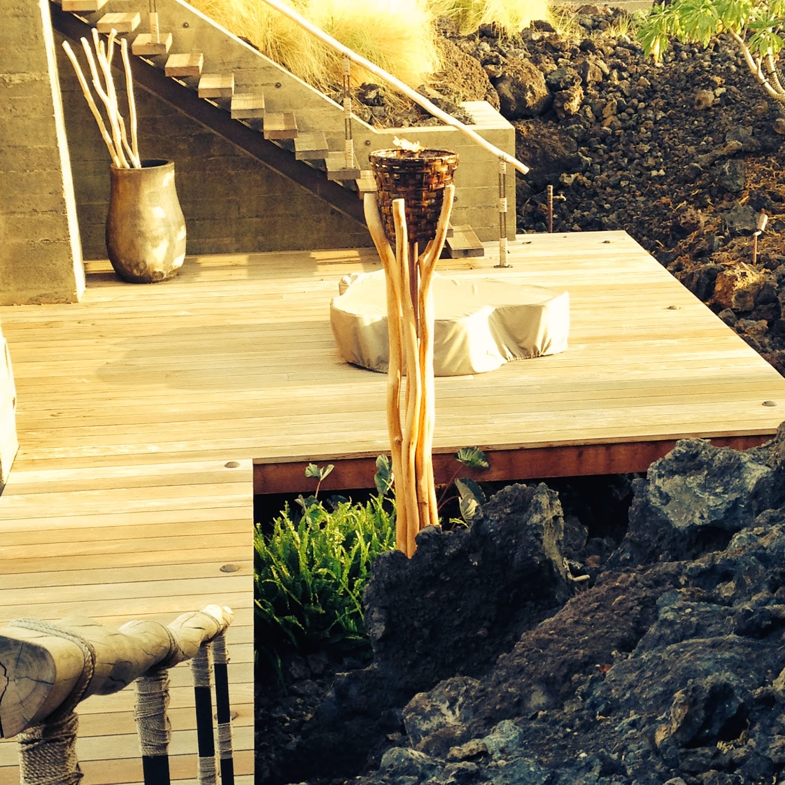 SCOTT NORWOOD FITZEL: Big Island woven copper tiki torches on ohia posts