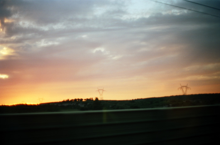 On My Way: Sunset through a train window