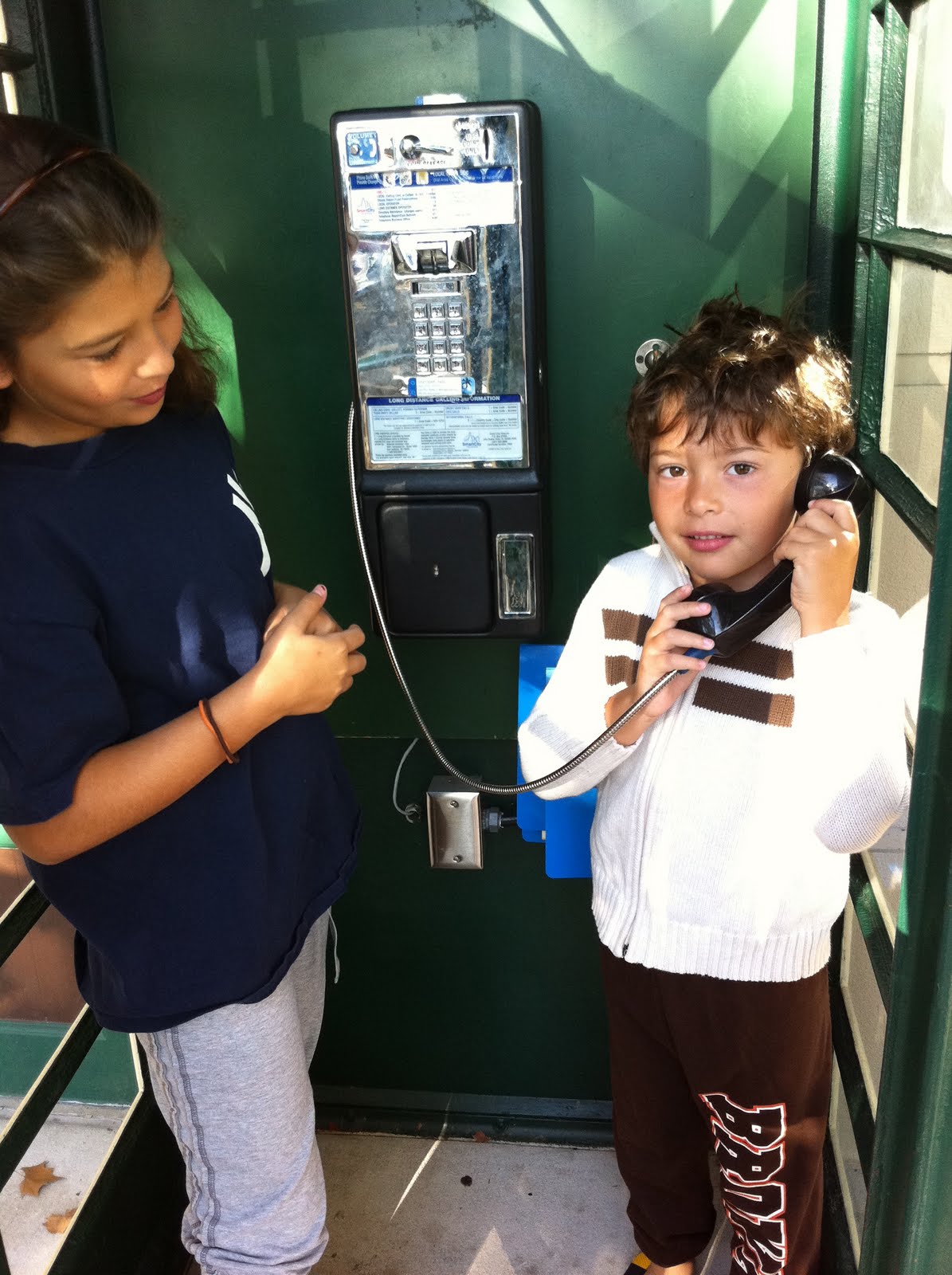 The Lowell Family: 1st time in a phone booth!
